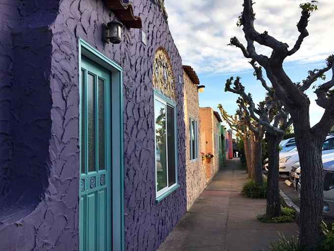 Each uniquely colored door and window tells a different story in Capitola's architectural rainbow, where no beige is allowed.