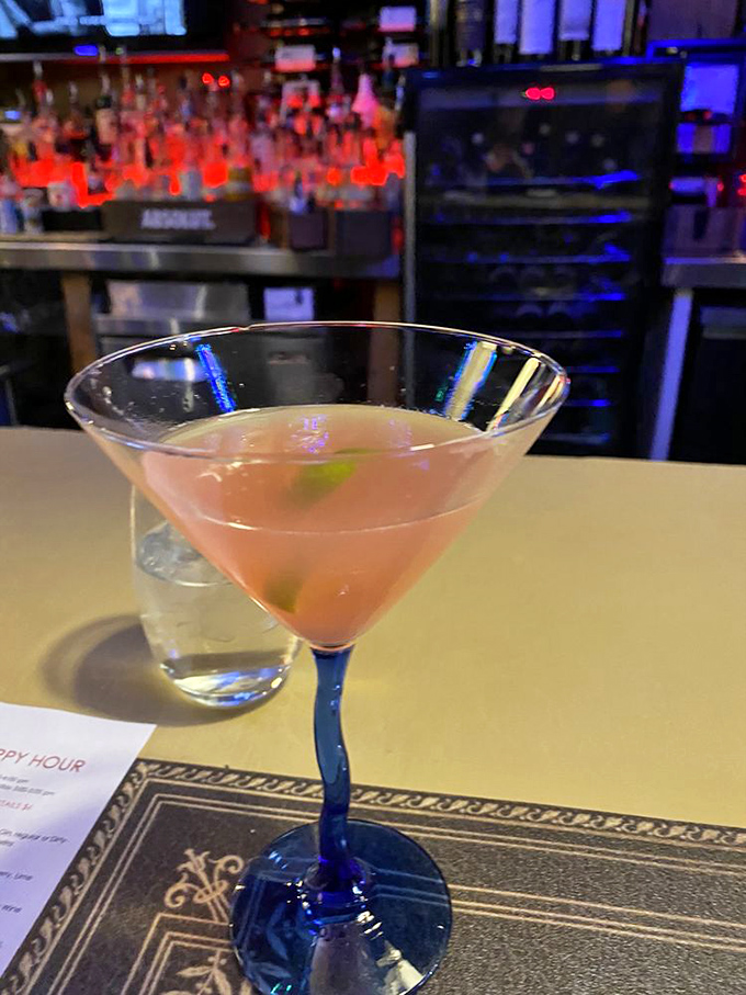 A martini glass filled with possibility and just enough alcohol to make you forget you ordered the 24-ounce porterhouse. Liquid courage comes in pretty packages.