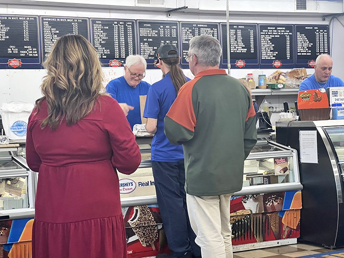 The menu board looms like the scoreboard at a championship game, with every option a potential winner in the hunger Olympics.