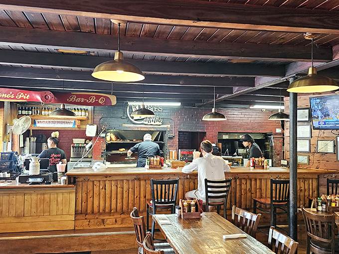 Where the magic happens &ndash; grab a counter seat and watch the pitmasters orchestrate their smoky symphony right before your eyes.