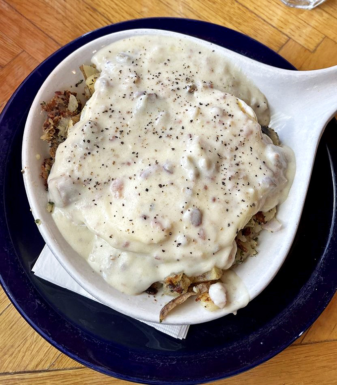 The country skillet – where potatoes, eggs, and breakfast meat unite in a cast iron symphony that would make your grandmother proud.