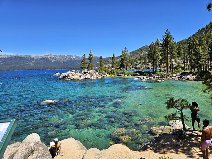 The water's so clear you can count fish doing their underwater ballet. Swimming here feels like sneaking into nature's private aquarium.