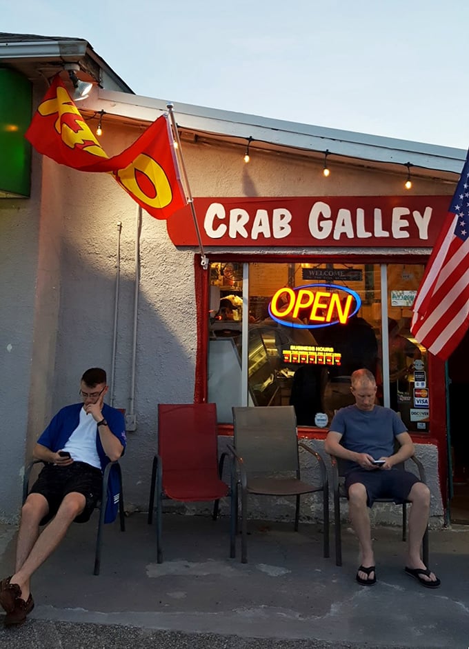 The true mark of greatness? Patrons so engrossed in their phones they've momentarily forgotten the seafood paradise awaiting them.