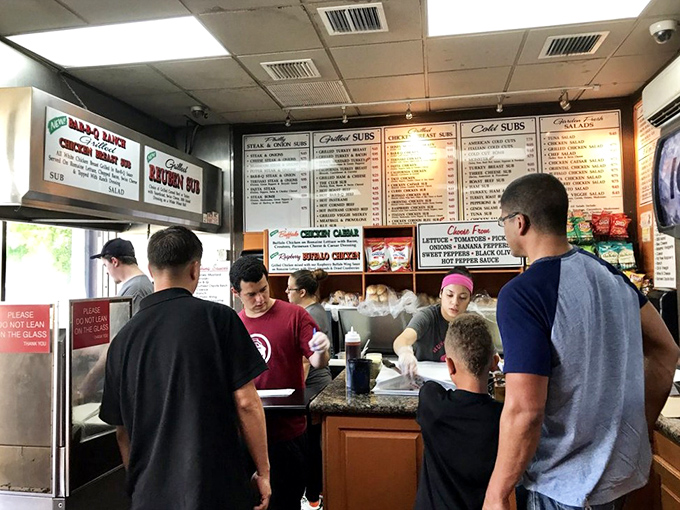 The lunch rush at Hungry Bear &ndash; a diverse crowd united by the universal language of exceptional sandwiches. Worth the wait every time.