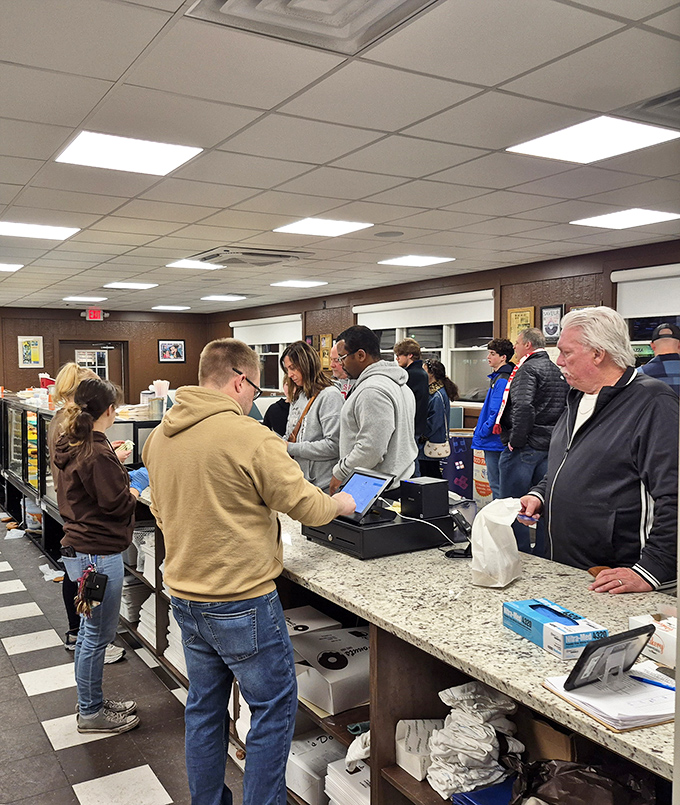 The pilgrimage to the counter &ndash; where strangers become united in their quest for the perfect fried dough experience.