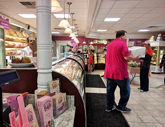 Where dessert dreams come true&mdash;customers patiently wait their turn while eyeing the curved display cases filled with edible works of art.