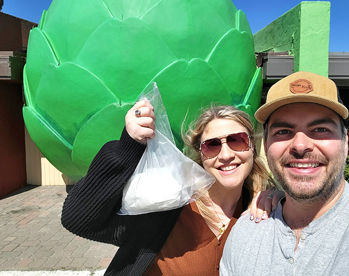 The giant artichoke isn't just a landmark&mdash;it's a mandatory selfie spot. Visitors proudly display their takeout treasures before heading back on the road.
