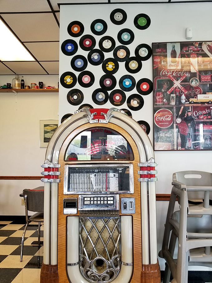 That jukebox isn't decorative&mdash;it's a working time machine. The vinyl record wall serves as both menu inspiration and dining soundtrack.