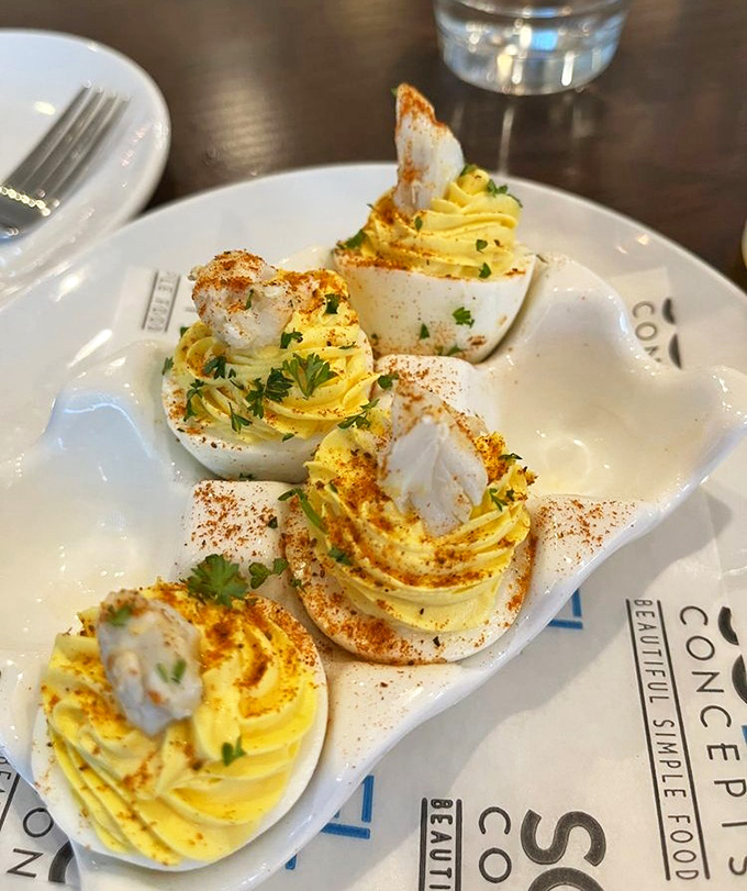 Deviled eggs elevated to art form&mdash;topped with fresh crab and a sprinkle of paprika, they're what regular deviled eggs dream of becoming.