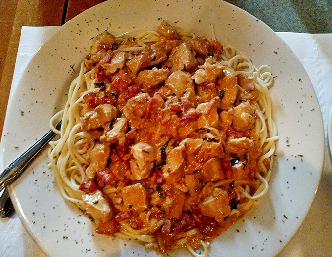 Diced chicken alla Vinnie&mdash;where tomato sauce meets tender chicken in a relationship so perfect it should have its own romance novel.