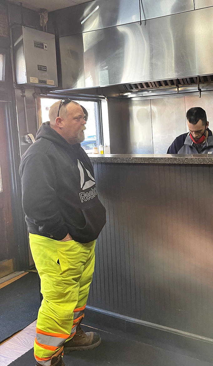 Where sandwich dreams come true. The customer's anticipation is palpable, like a kid waiting for Christmas morning.