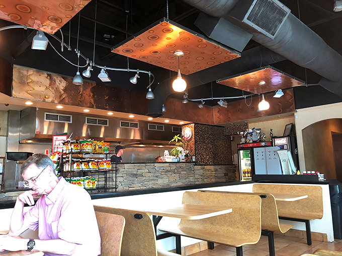 Modern meets traditional in this thoughtfully designed space where comfort food finds its perfect habitat.