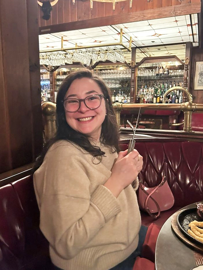 Happy diners make the best advertisements. That smile says everything you need to know about the Aberdeen Barn experience&mdash;pure culinary joy.