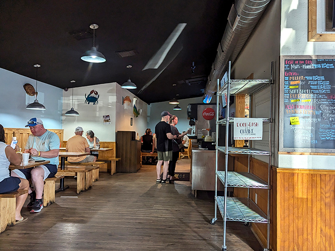 Where seafood dreams come true. The ordering counter buzzes with anticipation as patrons await their treasures from the deep.