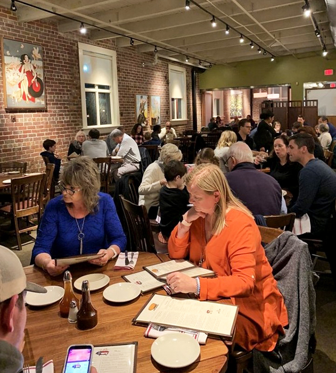 The universal language of barbecue brings together a diverse crowd. Conversations pause only for the important business of savoring each bite.