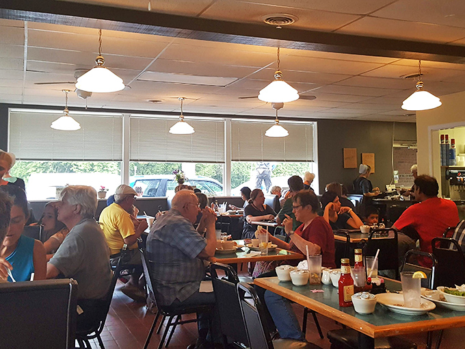 A bustling dining room filled with locals who know the secret: Katie's Kitchen isn't just a place to eat&mdash;it's where community happens.
