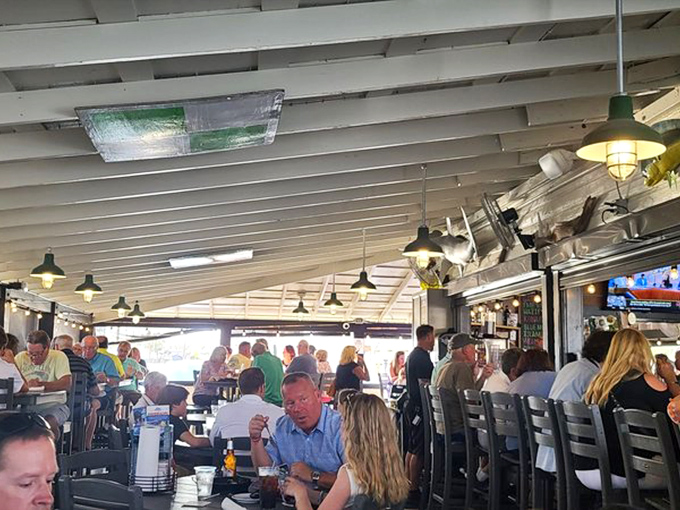 Happy diners in their natural habitat &ndash; surrounded by seafood and zero regrets about that third appetizer.