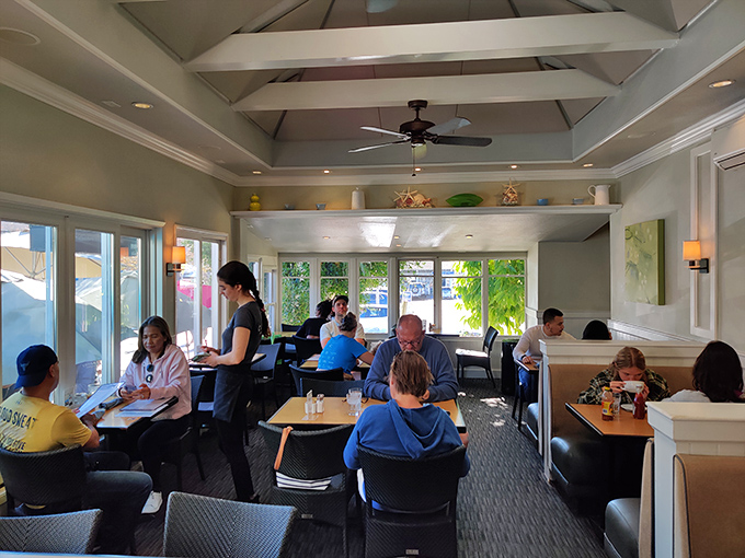 Where breakfast memories are made. The vaulted ceiling and coastal decor create the perfect backdrop for La Jolla's morning ritual.