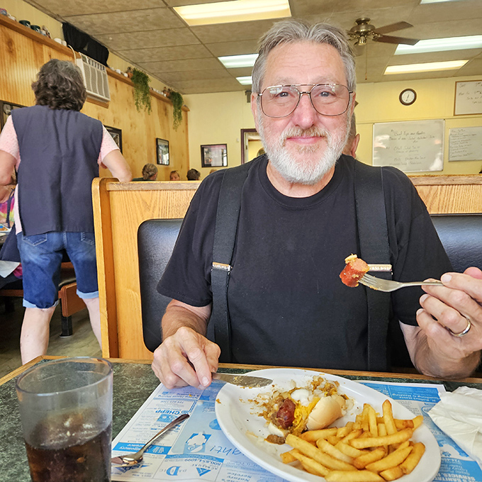 The universal language of contentment – locals enjoying another satisfying meal at their favorite spot.