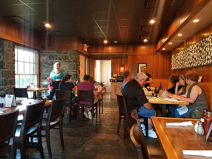 The dining room hums with the satisfied murmurs of patrons who've found their happy place. Conversation flows as freely as the barbecue sauce.