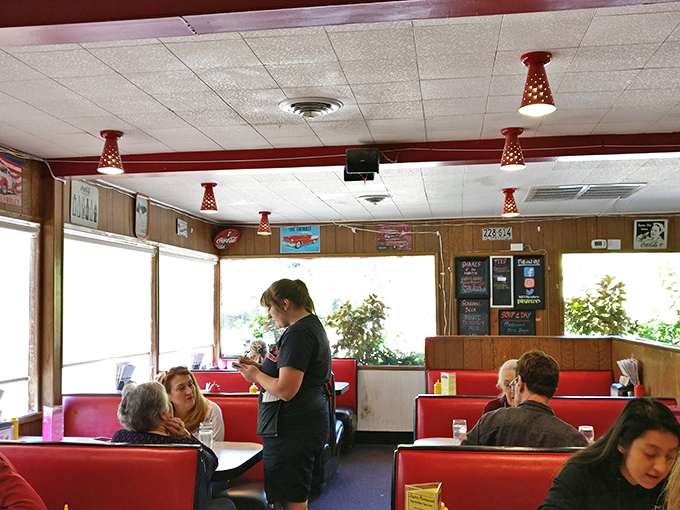 Where strangers become neighbors over burgers. That server isn't just taking orders; she's continuing a tradition of hospitality decades in the making.