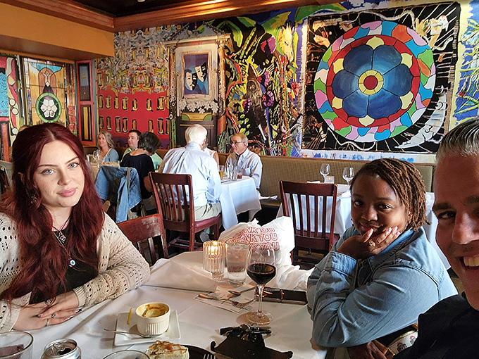 The true measure of a great restaurant: happy diners lost in conversation, momentarily pausing only to appreciate another perfect bite.