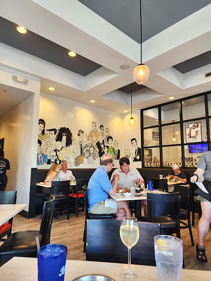 Where strangers become friends over shared appreciation of proper deli fare. The wall art silently approves of your ordering choices.