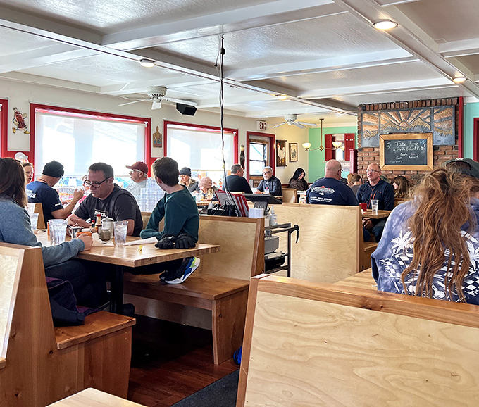 Where strangers become temporary breakfast companions. Notice nobody's looking at their phones&mdash;the food commands full attention here.