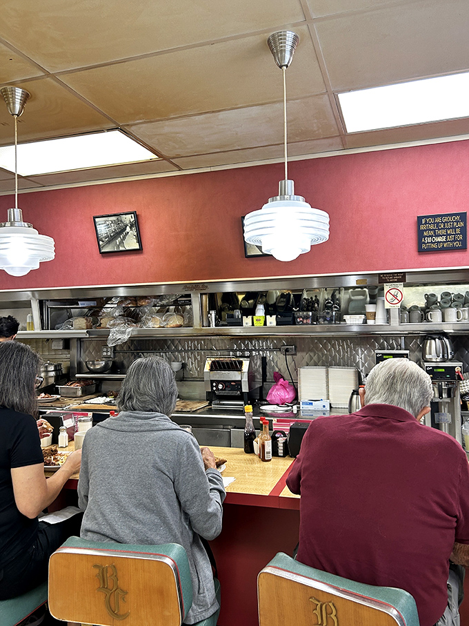 Counter dining at its finest&mdash;where strangers become temporary neighbors united by the universal language of "pass the syrup, please."