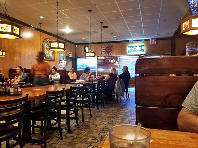 Where strangers become friends over shared salsa bowls. El Patron's dining room buzzes with the energy of satisfied customers and sizzling fajita platters.