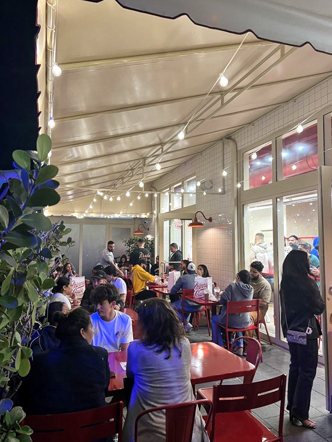 Under twinkling lights, strangers become friends united by the universal language of exceptional burgers. Miami nights were made for this.