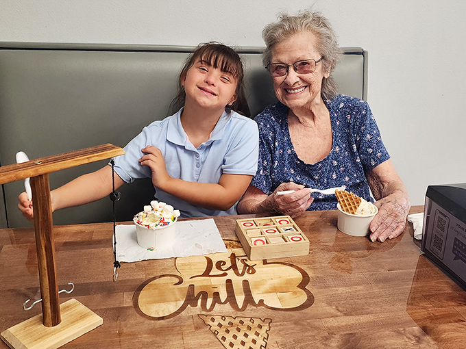 Multi-generational joy shared over scoops of happiness. Some bonds are best formed over waffle cones and shared spoons.