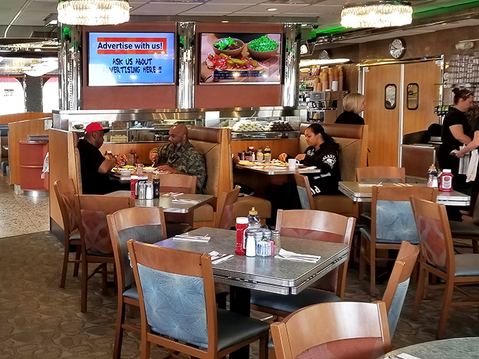 Where strangers become temporary neighbors, sharing nothing but space and the universal language of "that looks delicious" glances across the room.