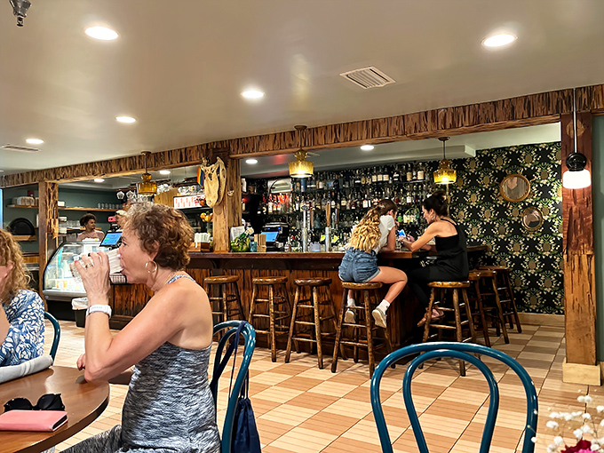 Happy diners discovering why some secrets are too good to keep to yourself for long.