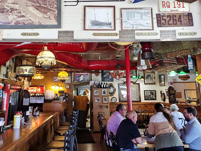 Happy diners discovering why this hidden gem has earned its reputation for exceptional lakeside dining.