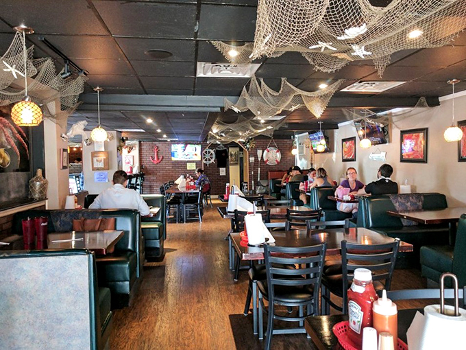 Fishing nets on the ceiling, seafood on the tables. This dining room isn't decorated&mdash;it's setting the stage for maritime magic.