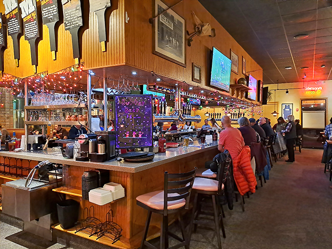 The bar area buzzes with energy as patrons perch on stools, proving that in Pennsylvania, good beer and conversation remain our favorite social media.