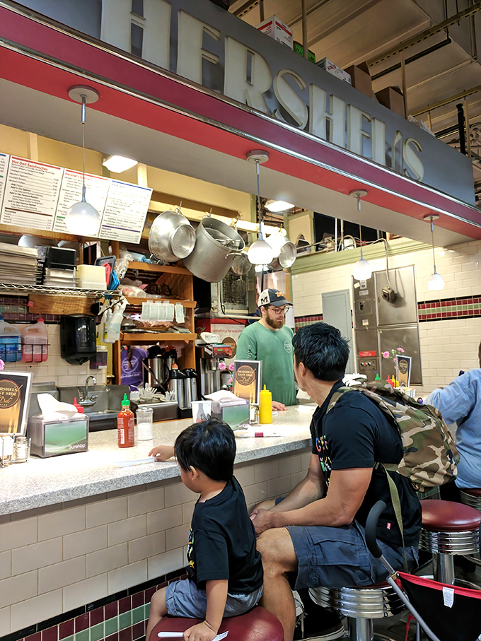 Not just a counter, but a community gathering spot where strangers become friends united by the universal language of good food.