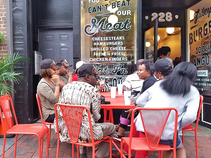 The universal language of good food brings people together at Sonny's outdoor tables. Shared bliss in the Philadelphia sunshine.