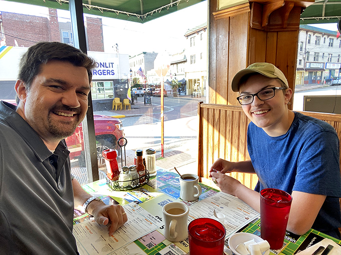 Happy diners plotting their next food move. That look of anticipation is universal &ndash; breakfast excitement knows no age limits.