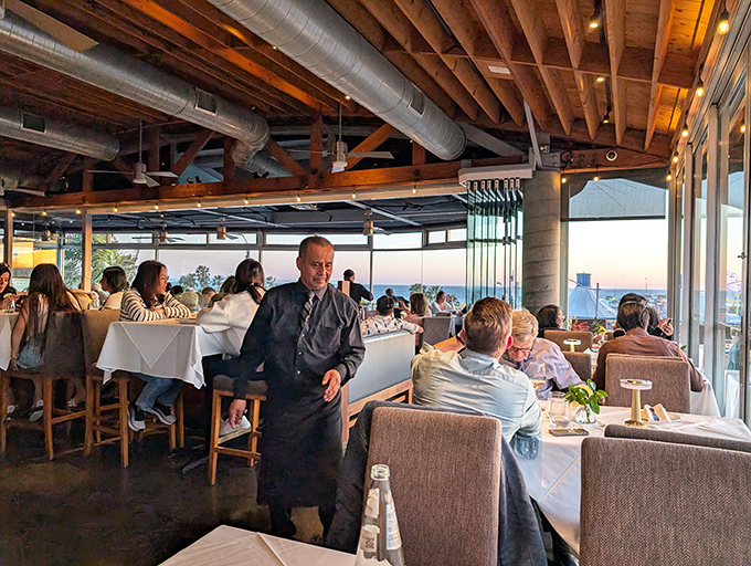 The dinner crowd settles in as servers navigate between tables, creating that perfect buzz of satisfied diners.