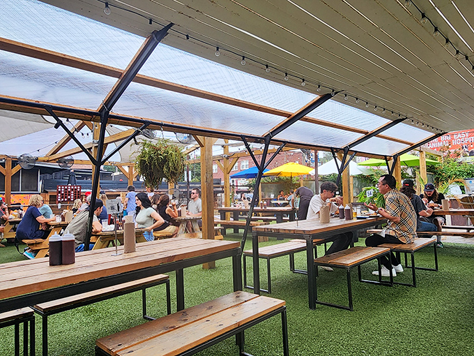 Under the shelter of a simple canopy, strangers become neighbors, united by the universal language of great barbecue.
