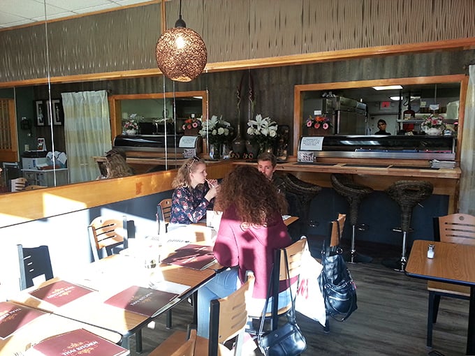 Happy diners experiencing that magical moment when exceptional food exceeds all expectations.