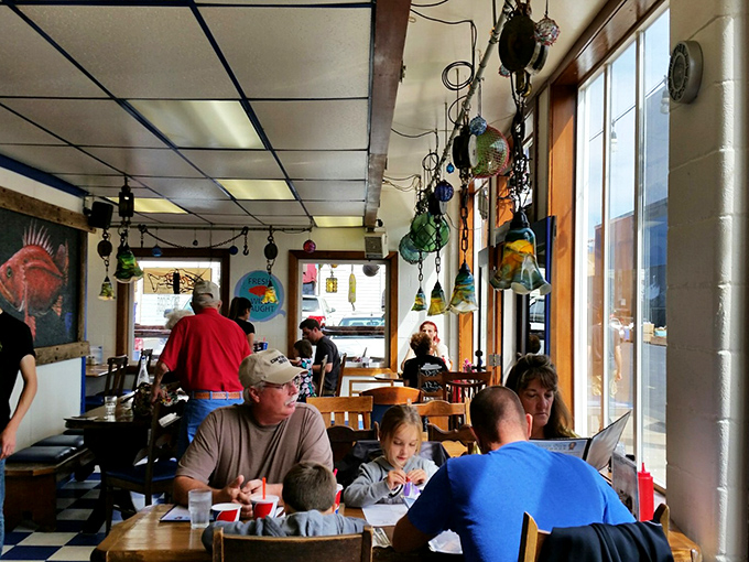 Where locals and visitors unite under the universal religion of good seafood. Notice how nobody's looking at their phones&mdash;the food commands full attention.