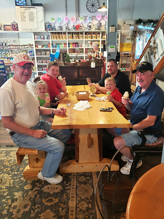 Multi-generational ice cream enjoyment proves that some pleasures transcend age, bringing families together one scoop at a time.