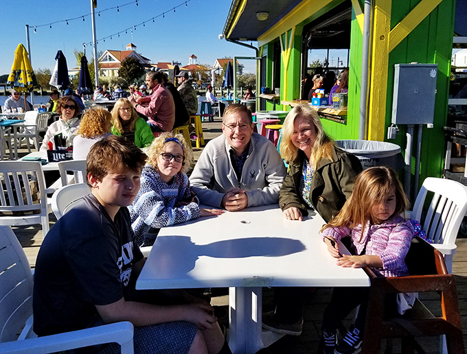 The outdoor seating area: where family memories are made and nobody minds if you get a little crab butter on your shirt.
