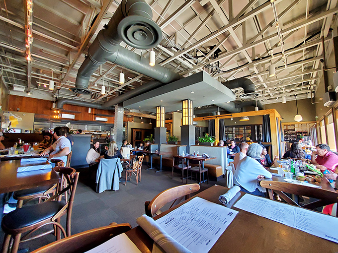 Where food lovers gather to worship at the altar of good taste. The exposed ductwork above is just industrial-chic confessional.