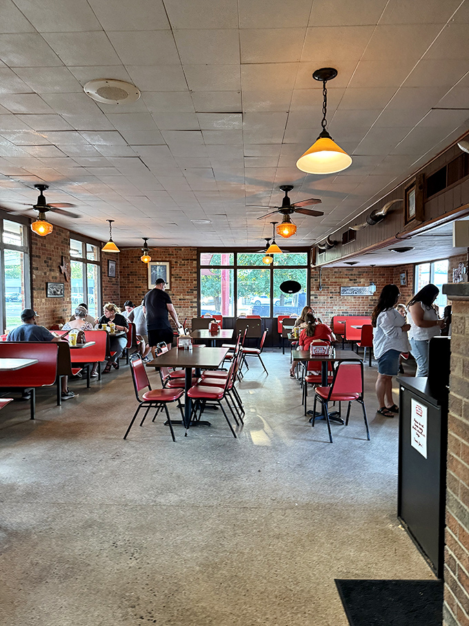 The dining room buzzes with the energy of people who know they've found something authentic in a world of culinary pretenders.