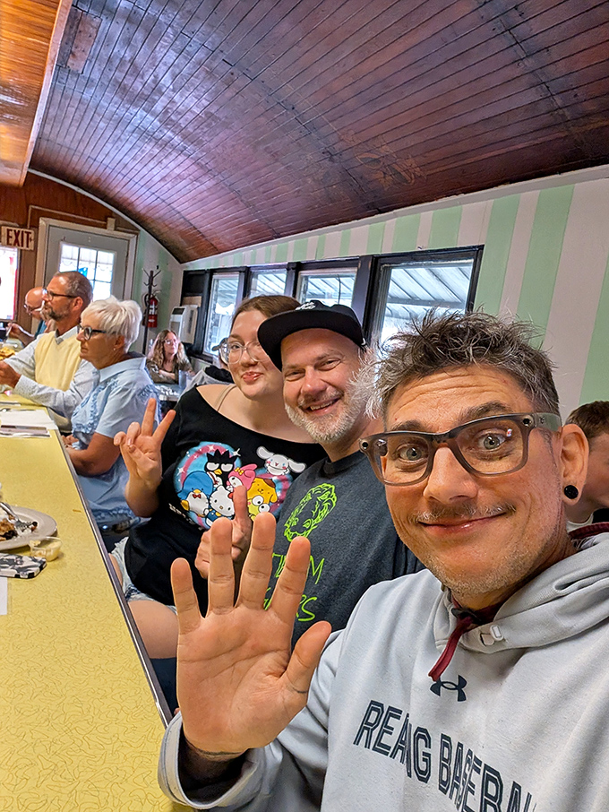 Happy diners proving that good food brings people together better than any social media app.