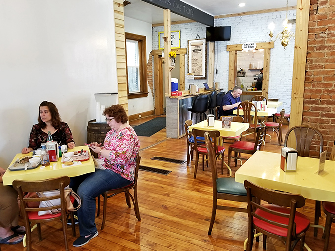 Real people enjoying real food. No Instagram posing here&mdash;just the serious business of barbecue appreciation.